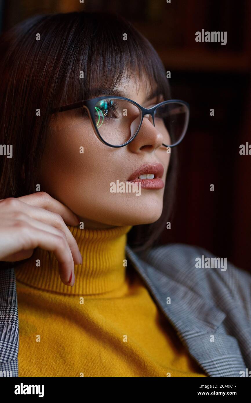 Brunette girl in glasses studying hi-res stock photography and images ...