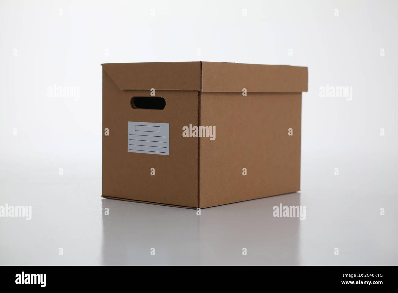 Cardboard parcel box isolated on white background Stock Photo - Alamy