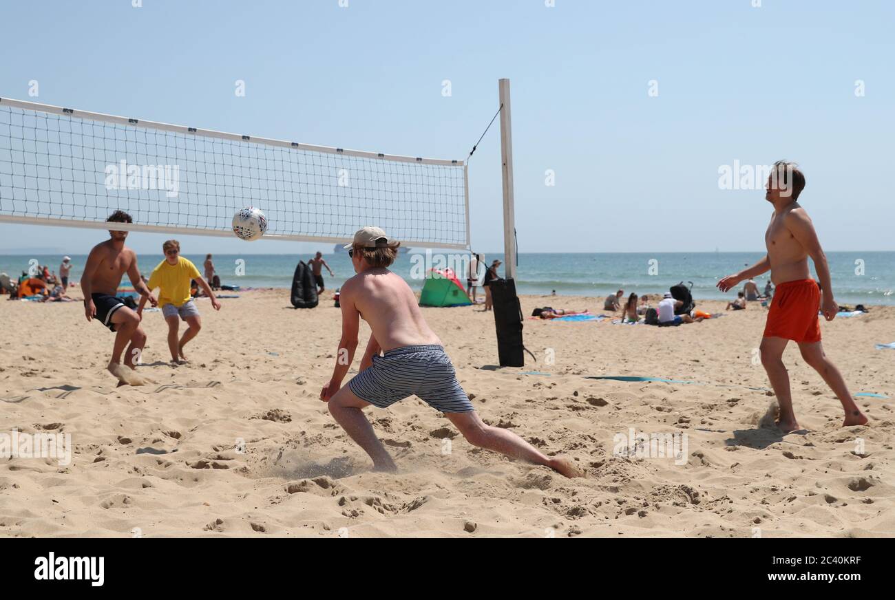 People play beach volleyball on Boscombe beach, as Britain is braced ... People play beach volleyball on Boscombe beach, as Britain is braced ...