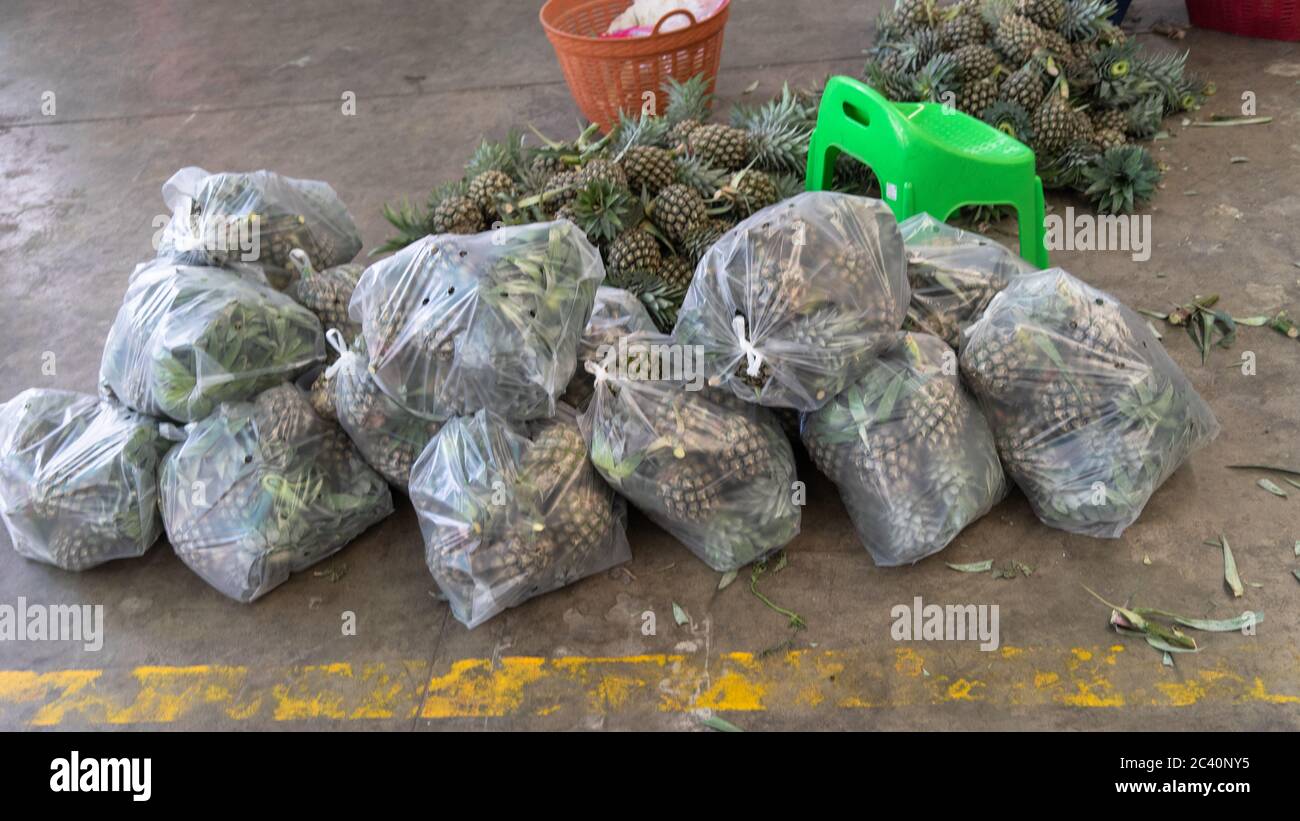 Pineapple was packaging in the plastic bag Stock Photo - Alamy