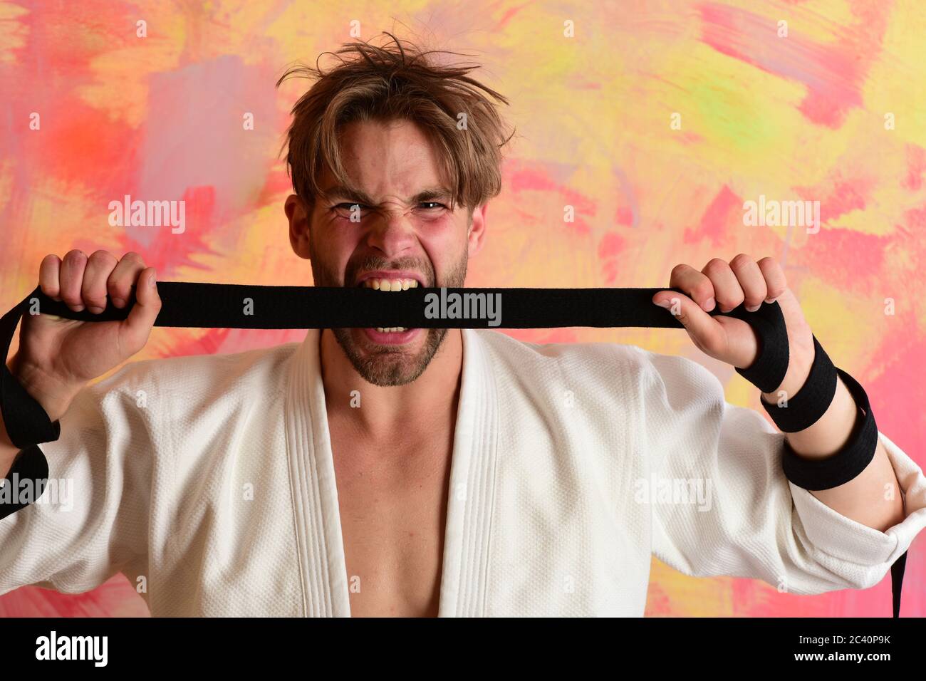 Healthy lifestyle and jujitsu concept. Man with wild face and bristle ...