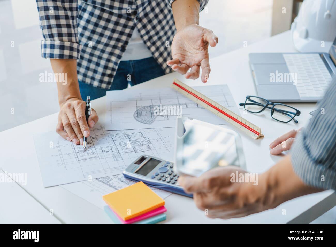 engineer Hand Drawing Plan On Blue Print with architect equipment ...