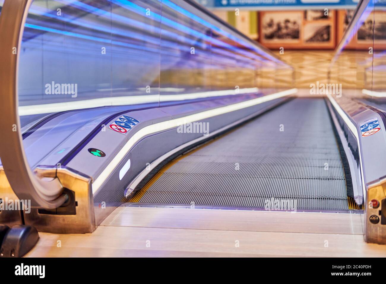 Moving walkway in shopping center. Horizontal slow-moving conveyor ...