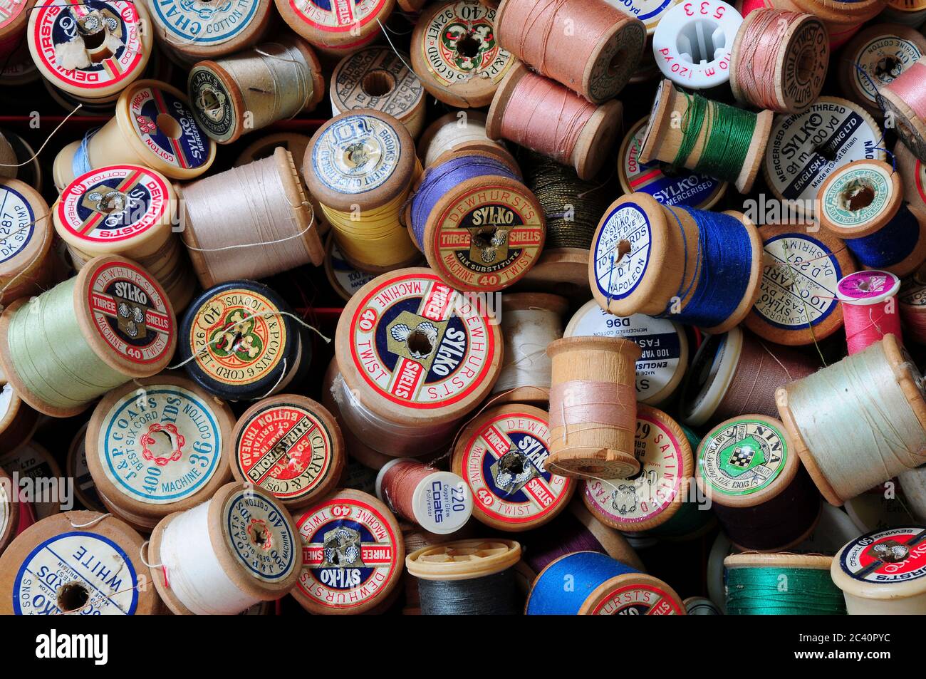 Old cotton reels in red plastic box Stock Photo - Alamy