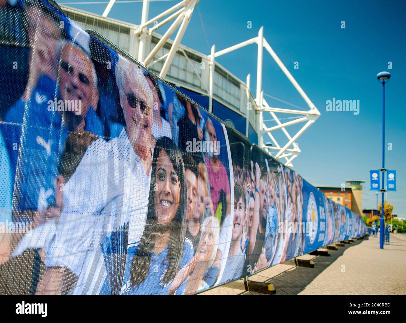Football fans behind fencing hi-res stock photography and images - Alamy