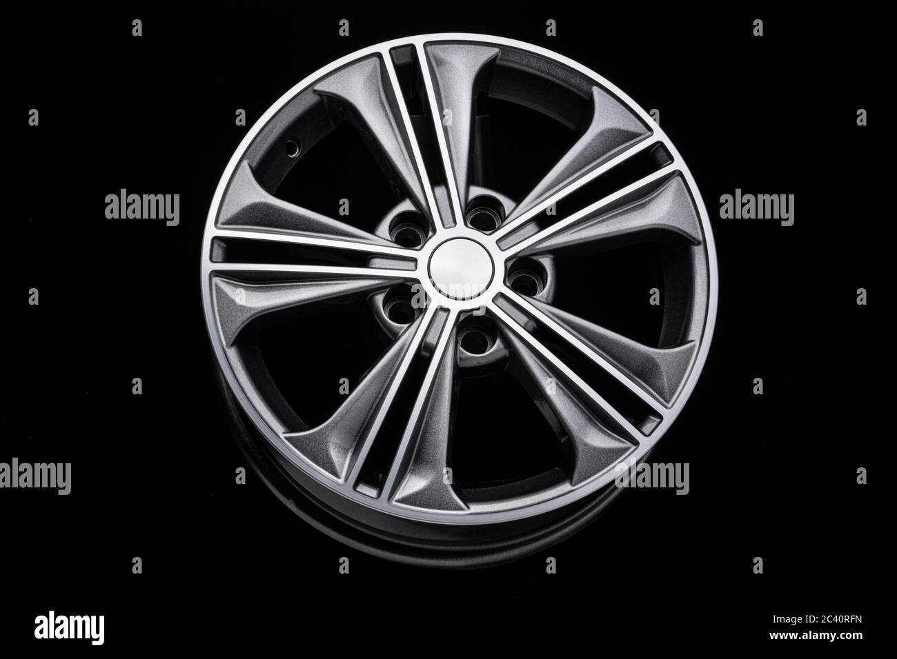 grey beautiful modern aluminum alloy wheel on black background Stock ...
