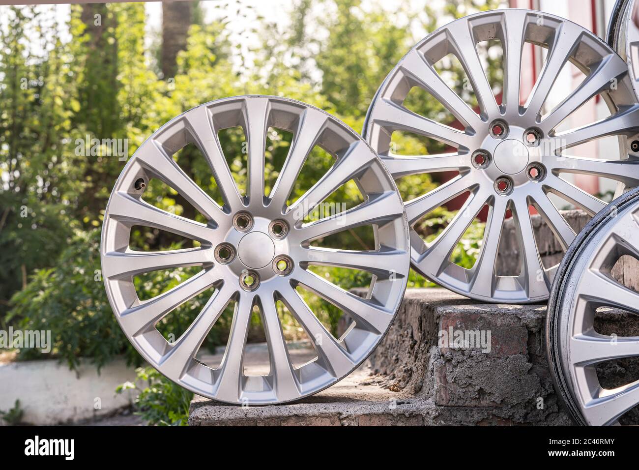 used alloy wheels in a silver color. Outside Stock Photo - Alamy