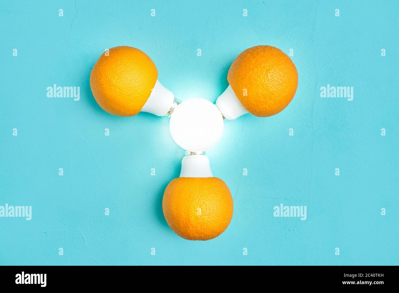 glowing light bulb orange on a turquoise background. creative ideas ...