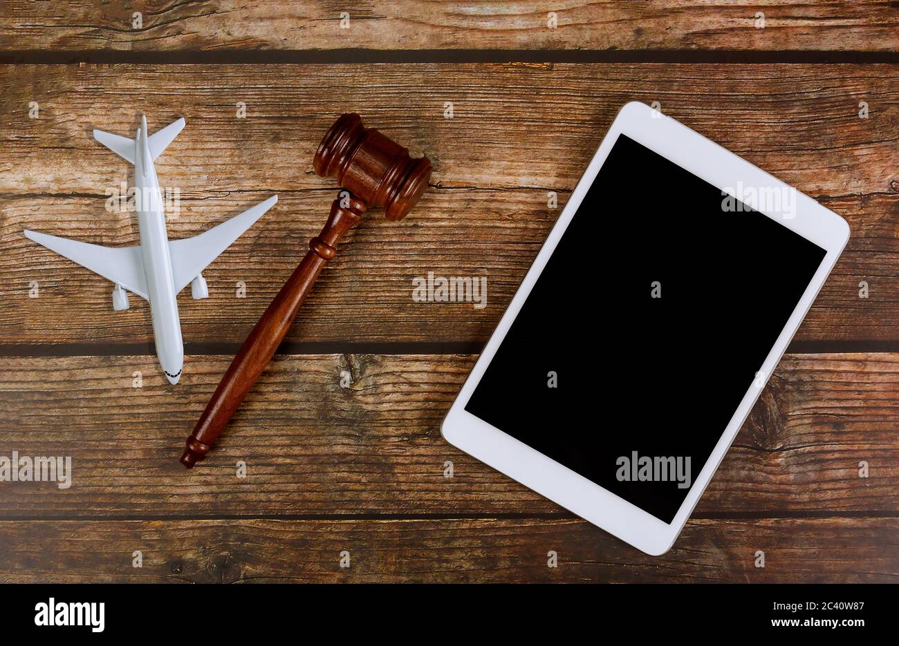 Judge traveling concept planning airplane in wooden judges gavel with ...