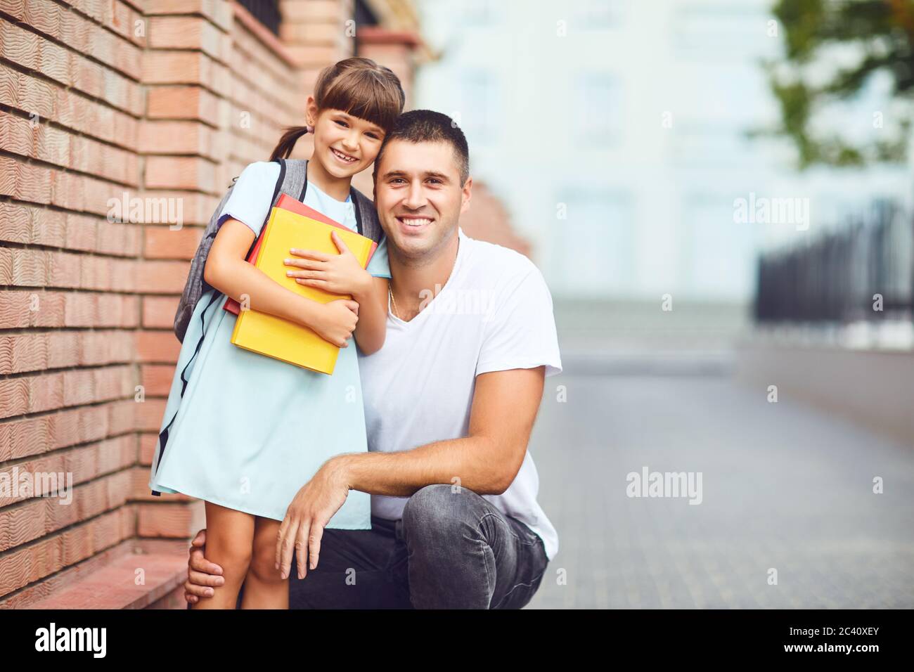 Father school uniform hi-res stock photography and images - Alamy