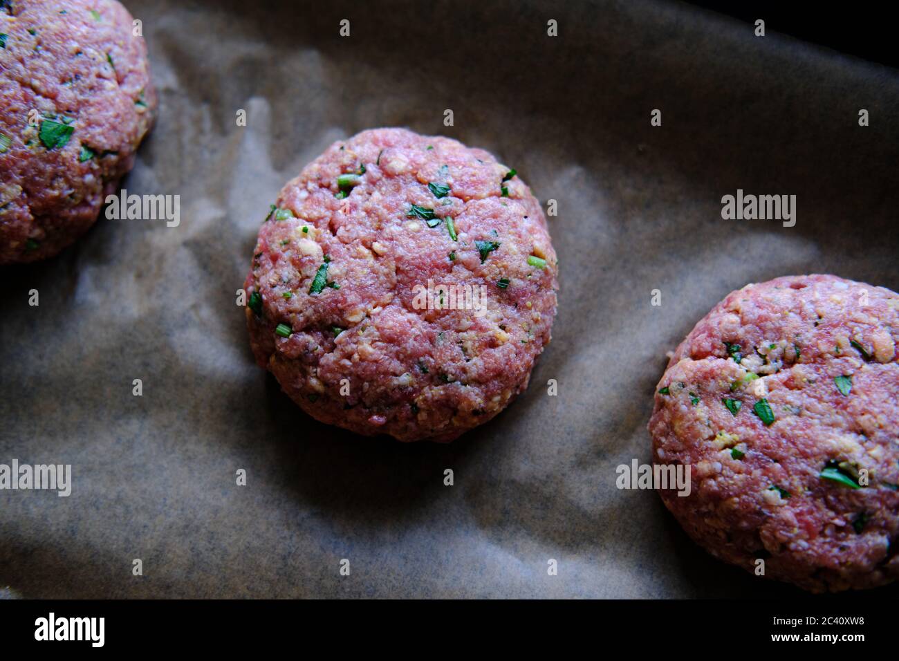 Preparing burger patties, raw burger meat. Concept for making homemade ...
