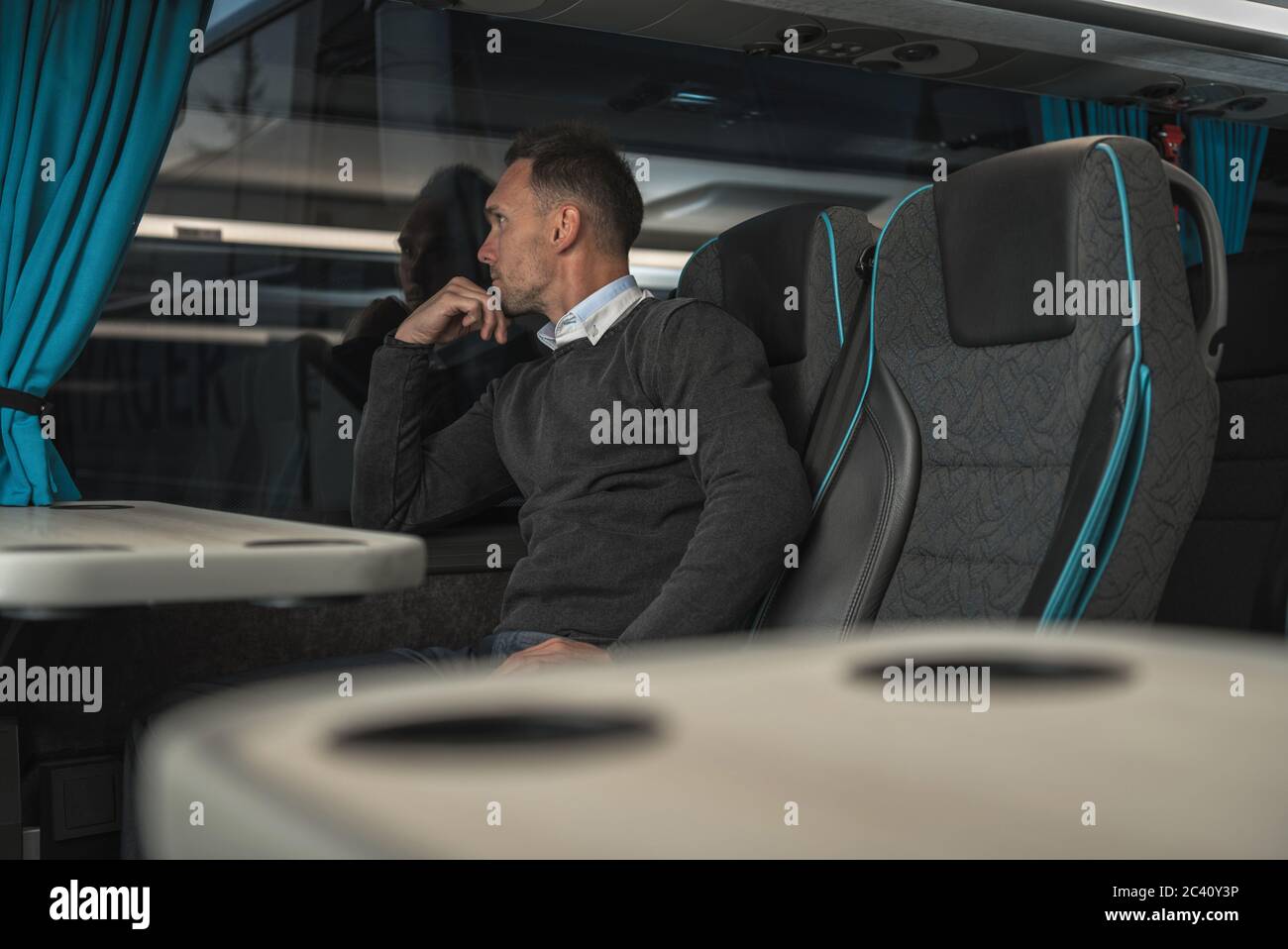 Comfortable Luxury Coach Bus Travel. Caucasian Men in His 40s on the ...