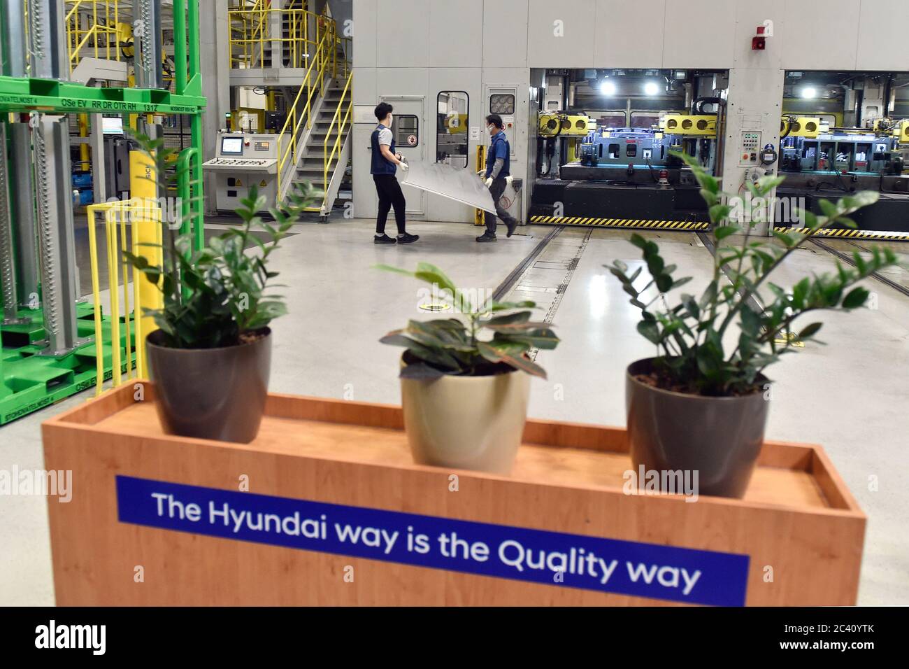 Employees work on the assembly line at the Hyundai's Czech plant in ...