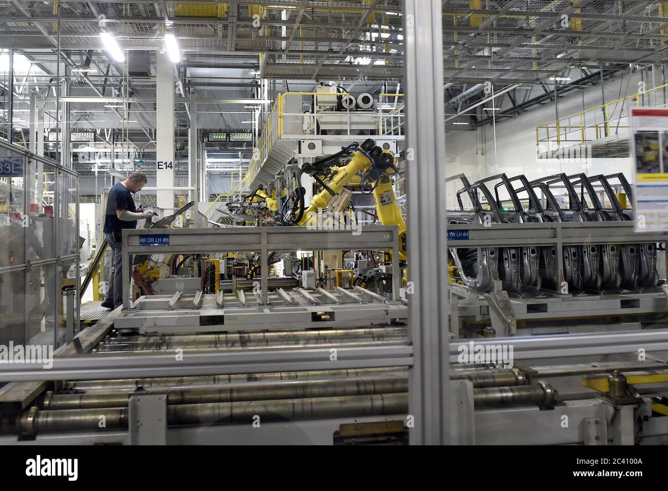 Employees work on the assembly line at the Hyundai's Czech plant in ...