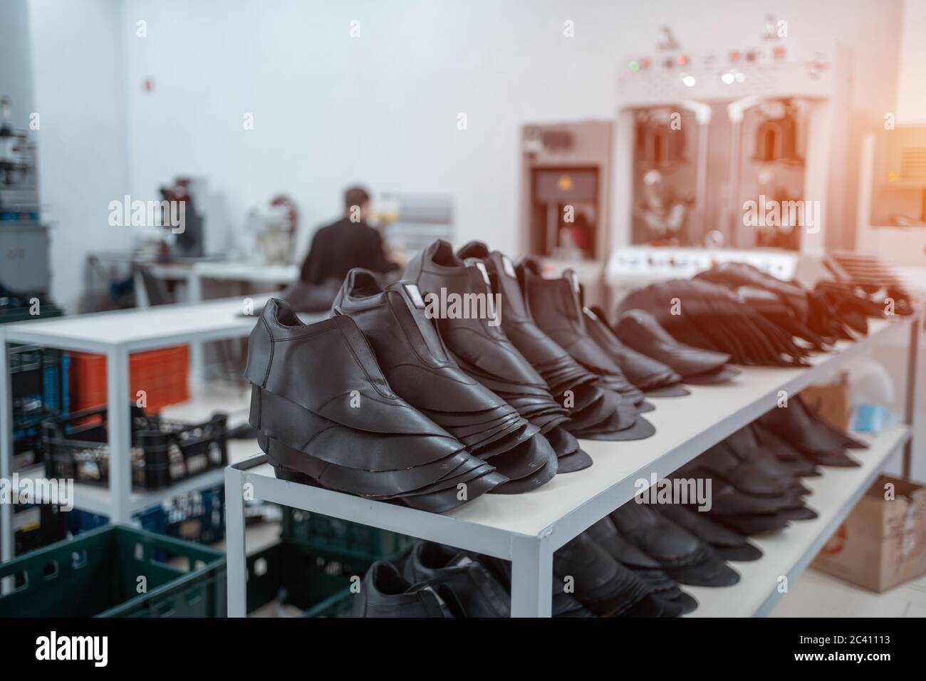 leather molding for modern shoes on factory Stock Photo - Alamy