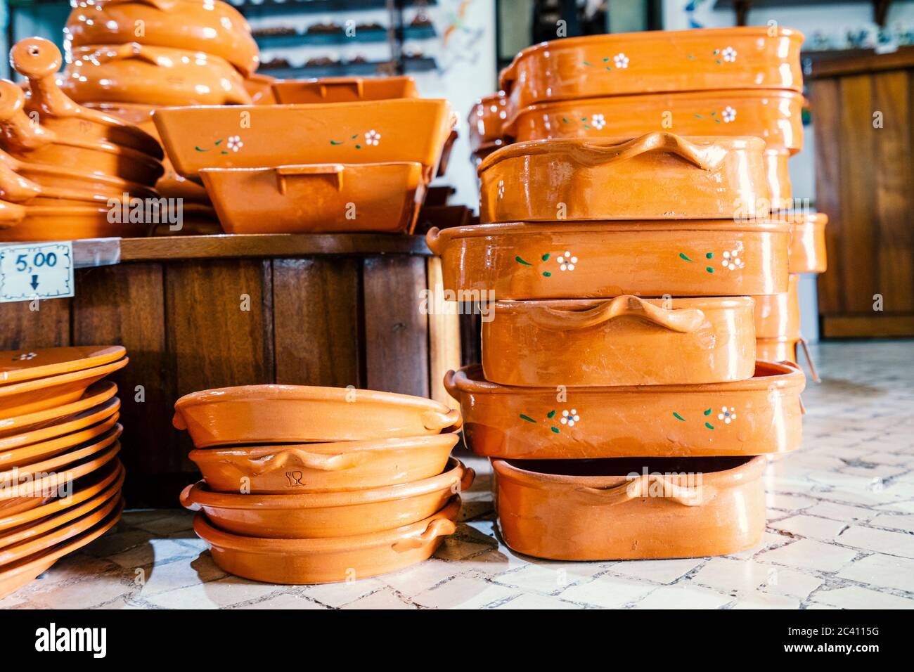 Traditional Portuguese pot made of clay sold in a shop Stock Photo - Alamy