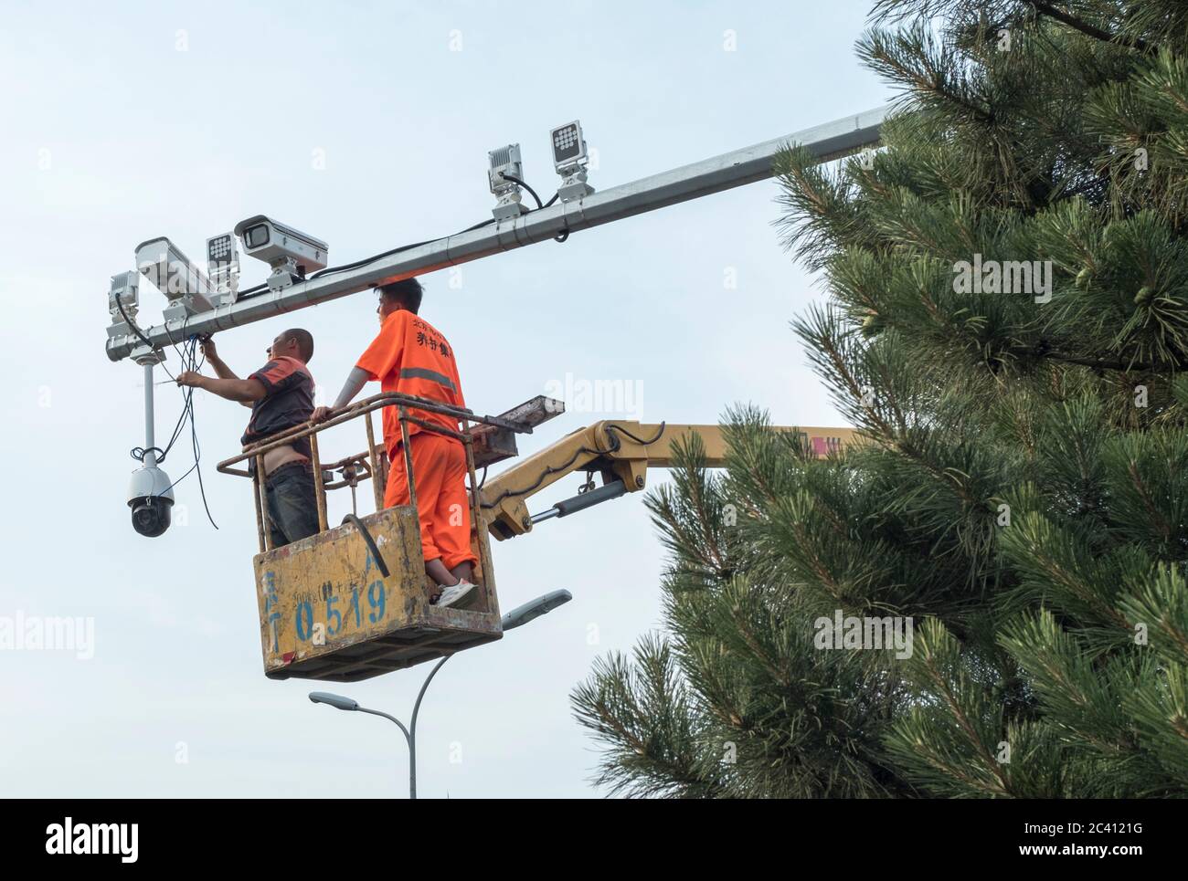 Chinese workers check CCTV cameras in Beijing, China. 21-Jun-2020 Stock ...