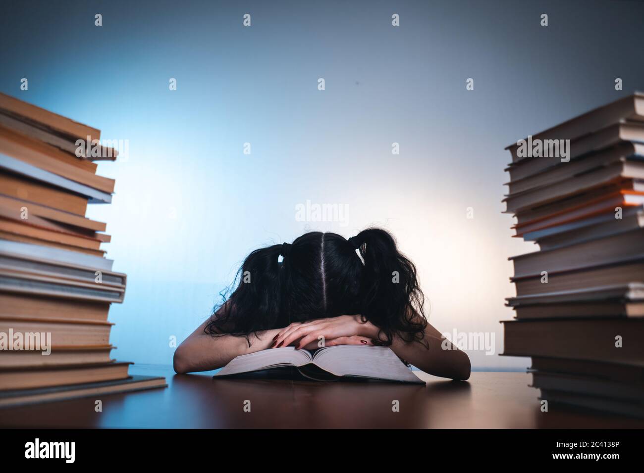 Stressed student reading book hi-res stock photography and images - Alamy