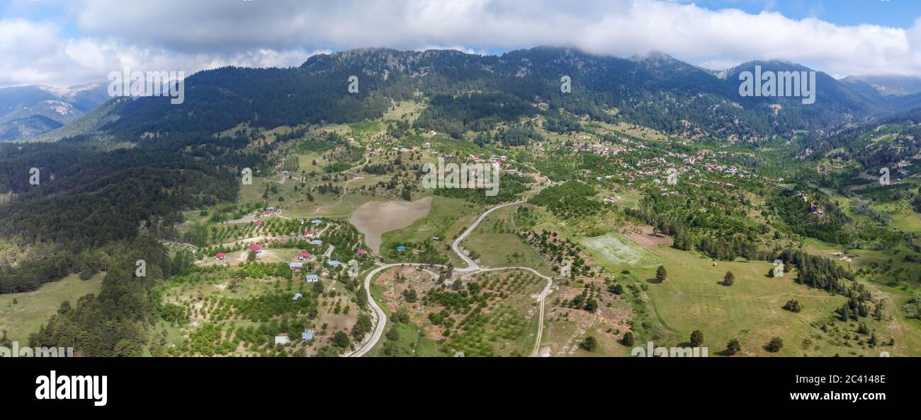 A bird's-eye view of the small village in the magnificent nature. Drone ...