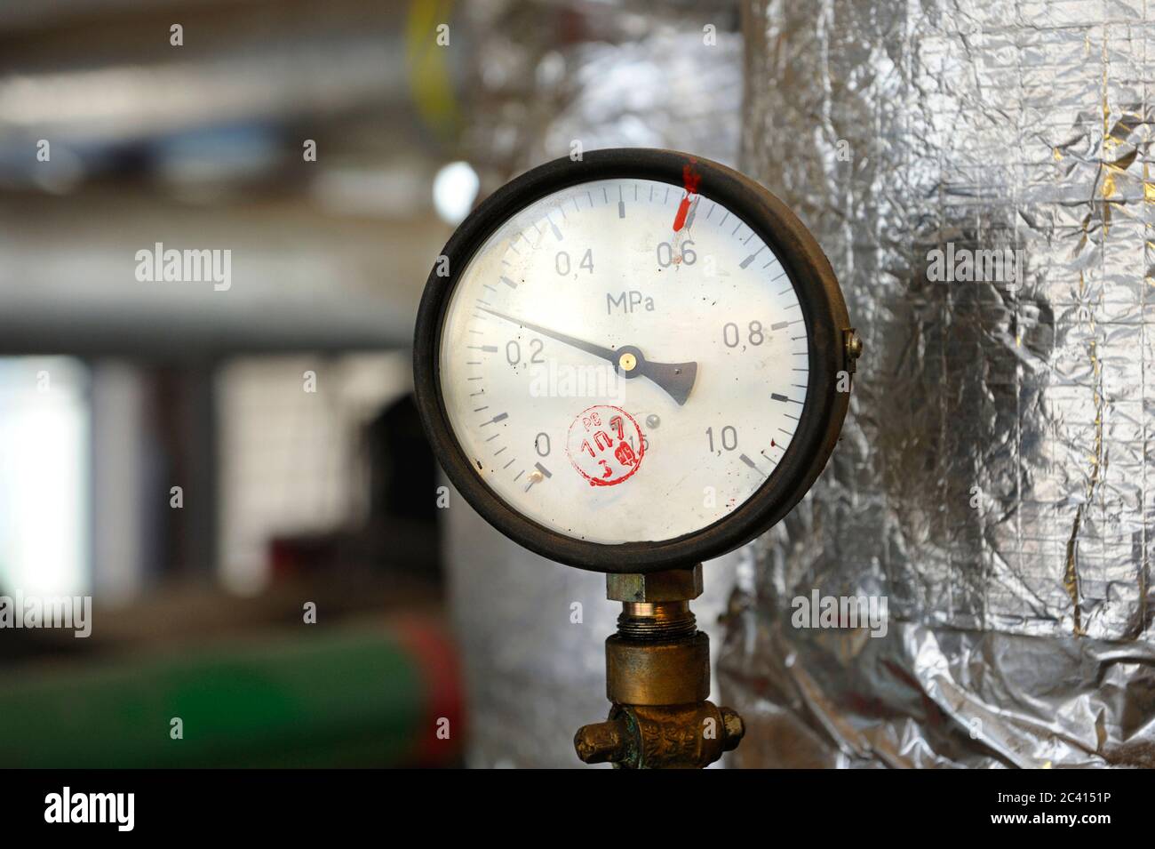 Manometer showing level of steam pressure inside of the steam ...