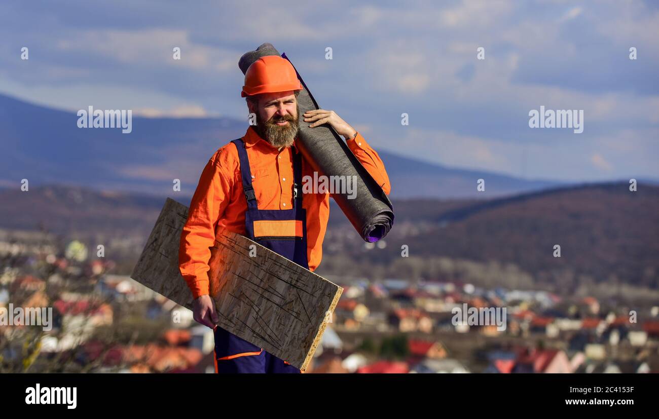 new roof under construction residential building. builder use roofing ...