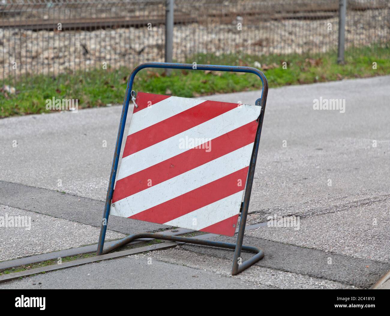 Strapped Warning Sign Square at Street Caution Stock Photo - Alamy