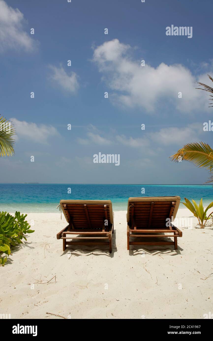 Sun beds on the beach Stock Photo - Alamy