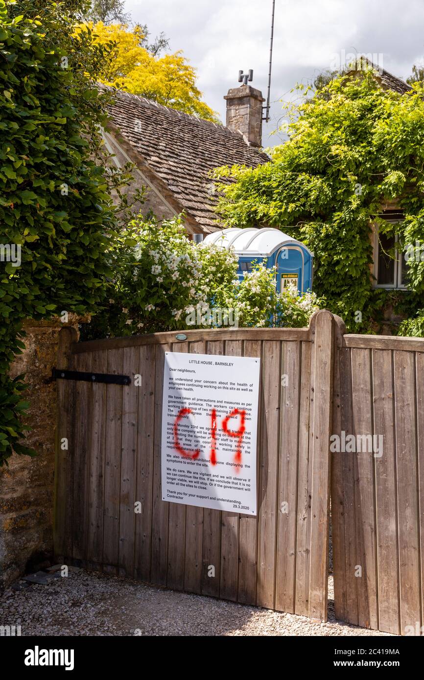 A notice on the gate of a property undergoing construction work ...