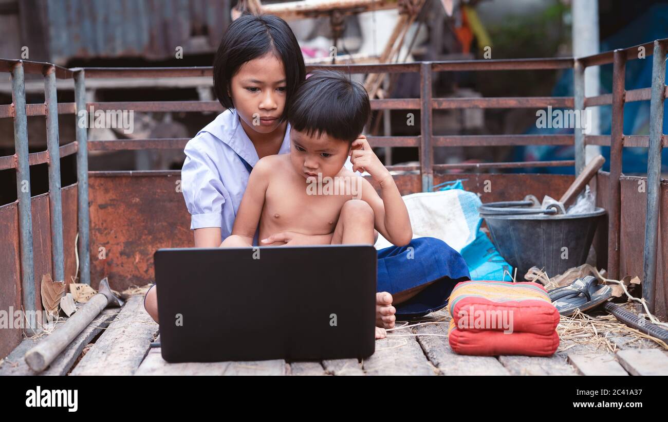 Brother sister computer uniform hi-res stock photography and images - Alamy