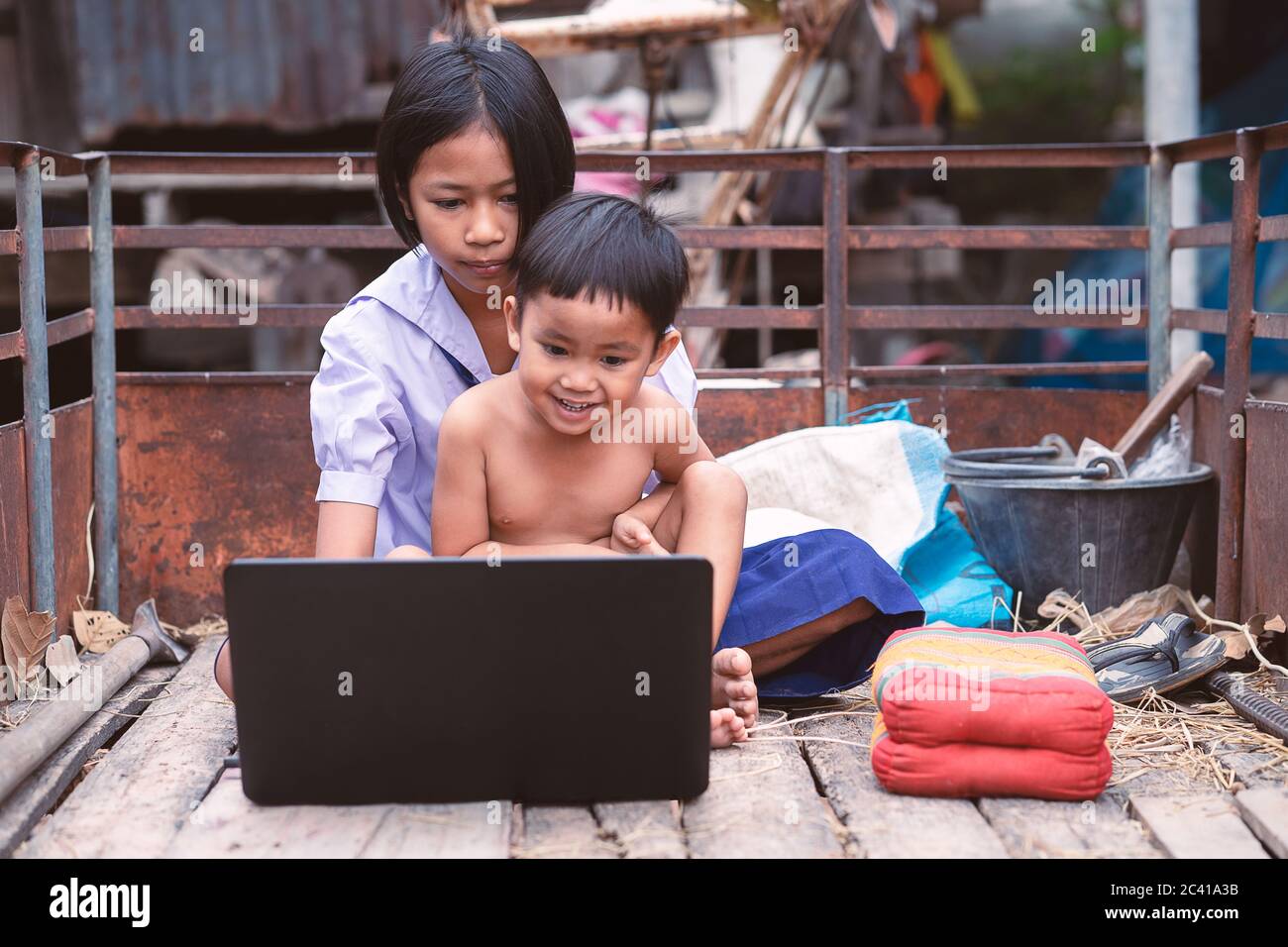 Brother sister computer uniform hi-res stock photography and images - Alamy