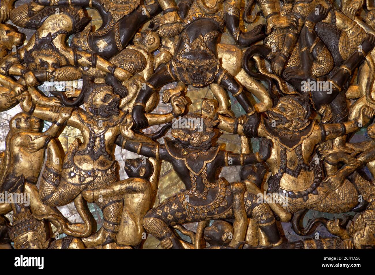 Relief picture with fighting monkeys Stock Photo - Alamy