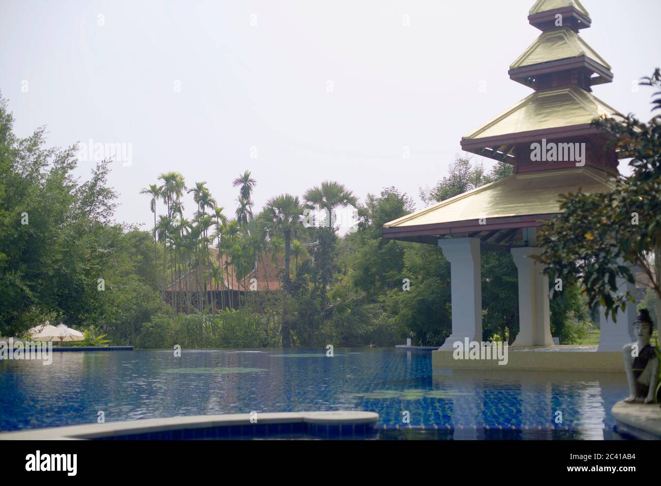 Pagoda by a swimming pool Stock Photo - Alamy