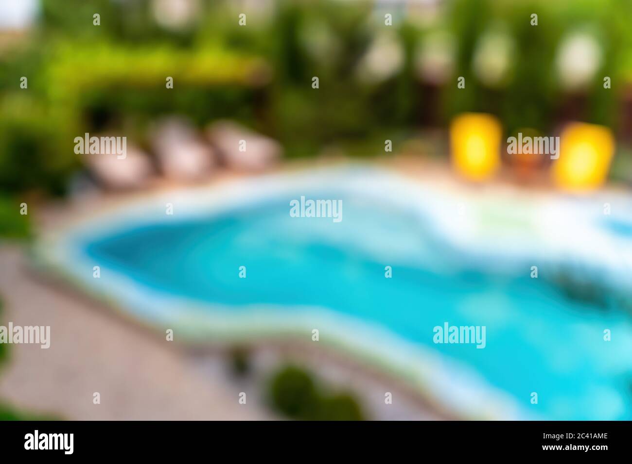 Abstract blur swimming pool in hotel resort for background. holiday ...