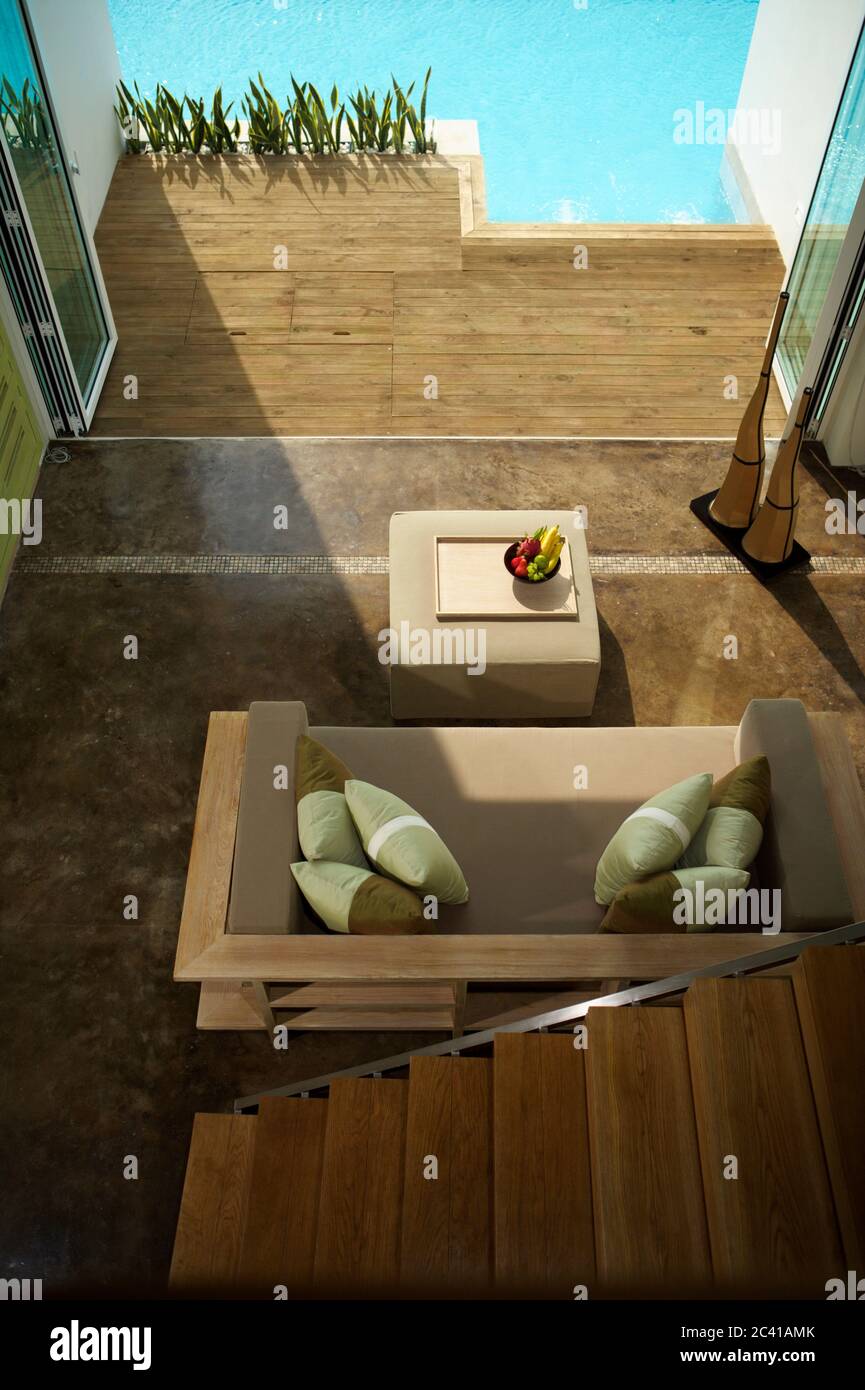 Terrace with couch in front of a pool - wellness hotel style Stock ...