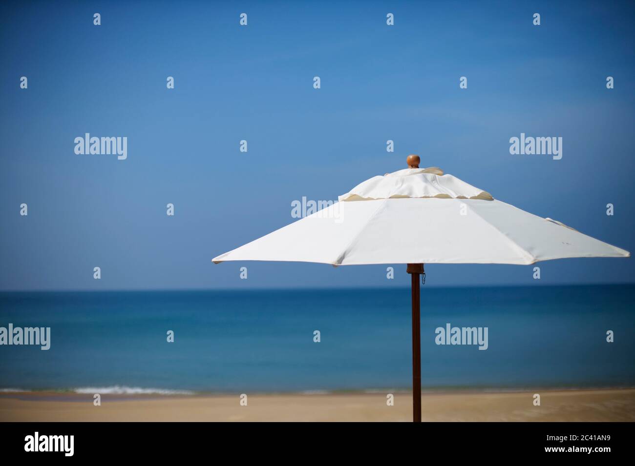 Parasol on the beach - paradise - vacation Stock Photo - Alamy
