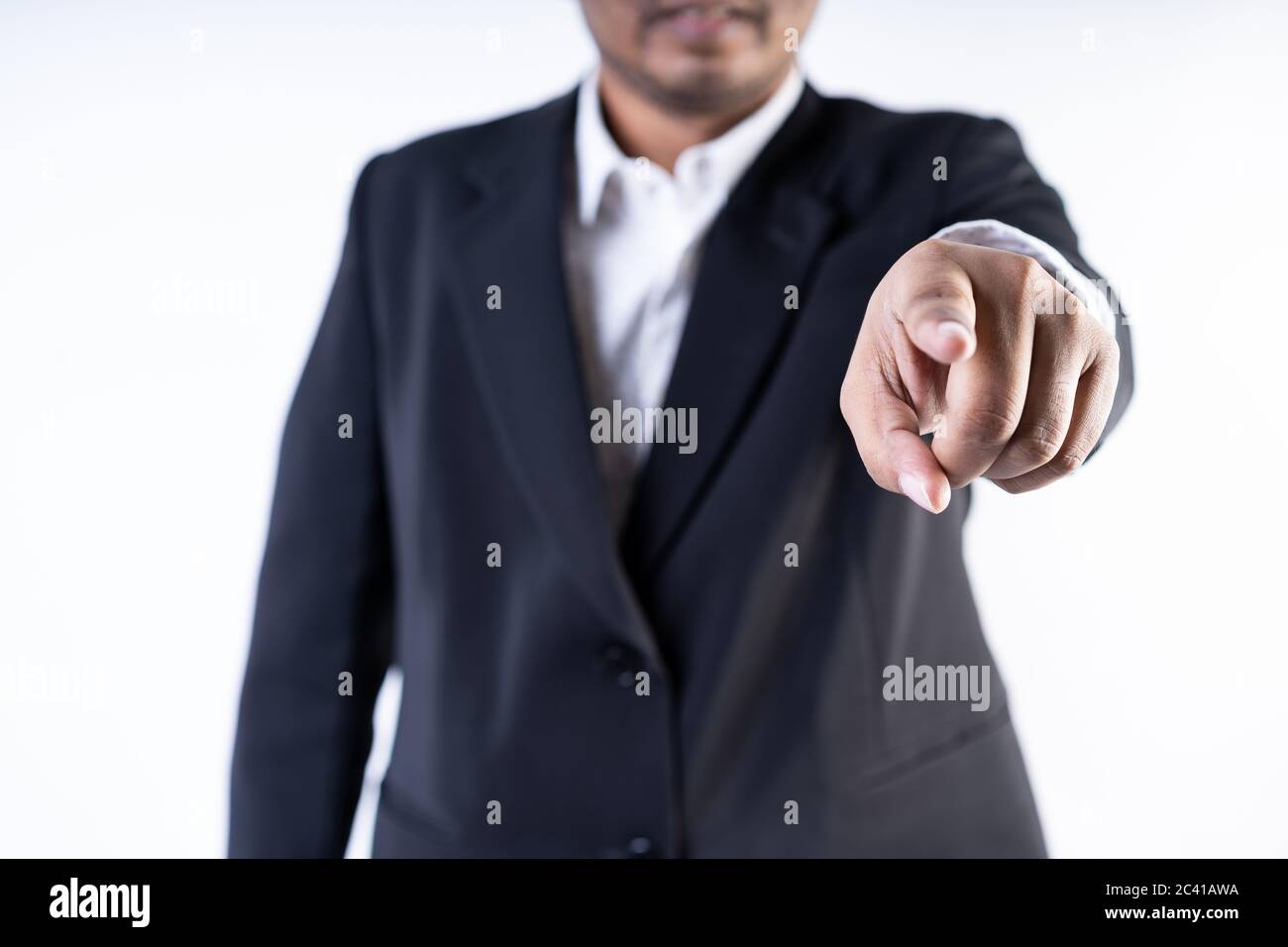 Isolated Closed up shot of an asian men pointing at the camera wearing ...