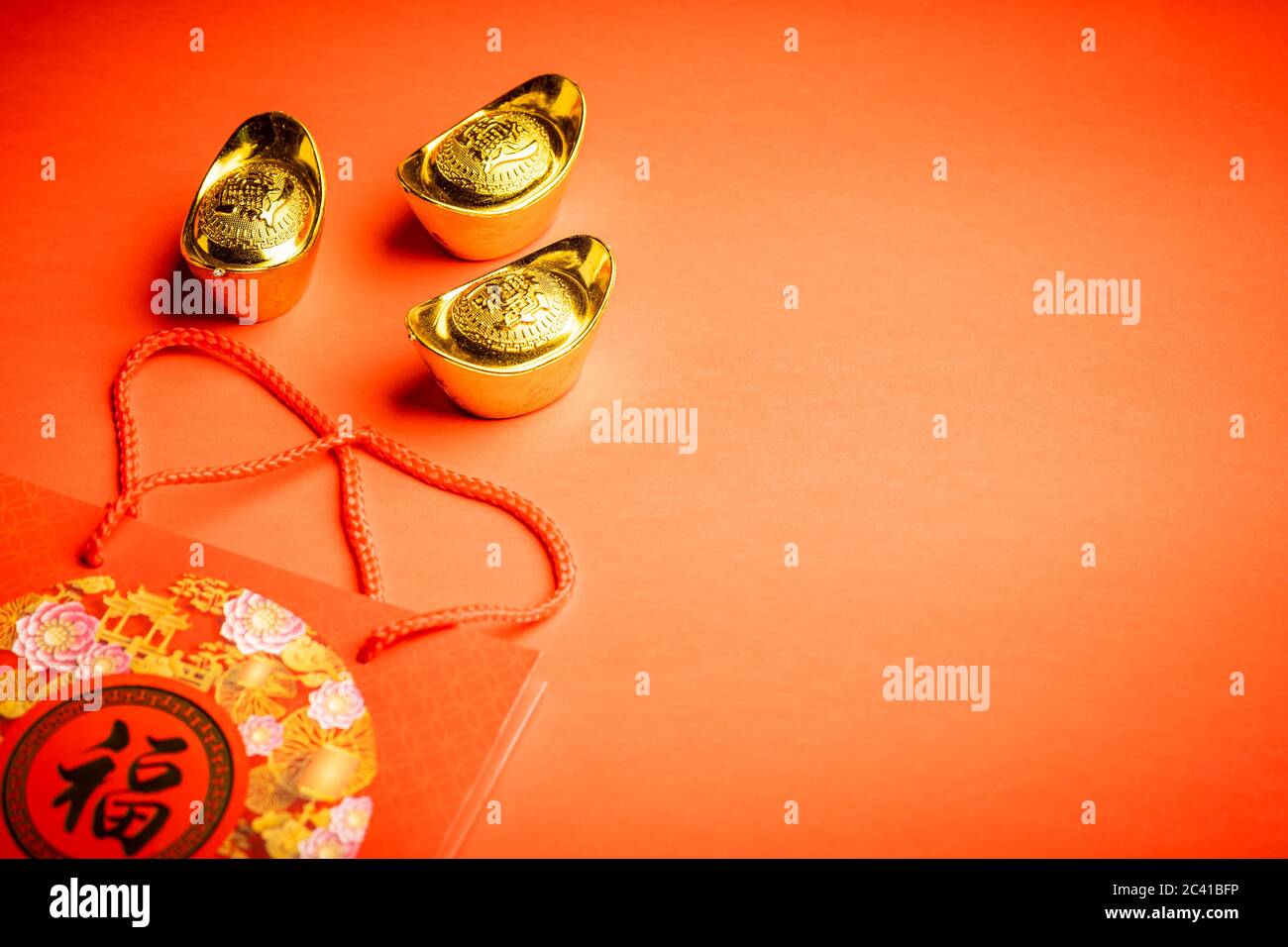 Chinese New Year background. The wordings on gold bar is chinese words ...
