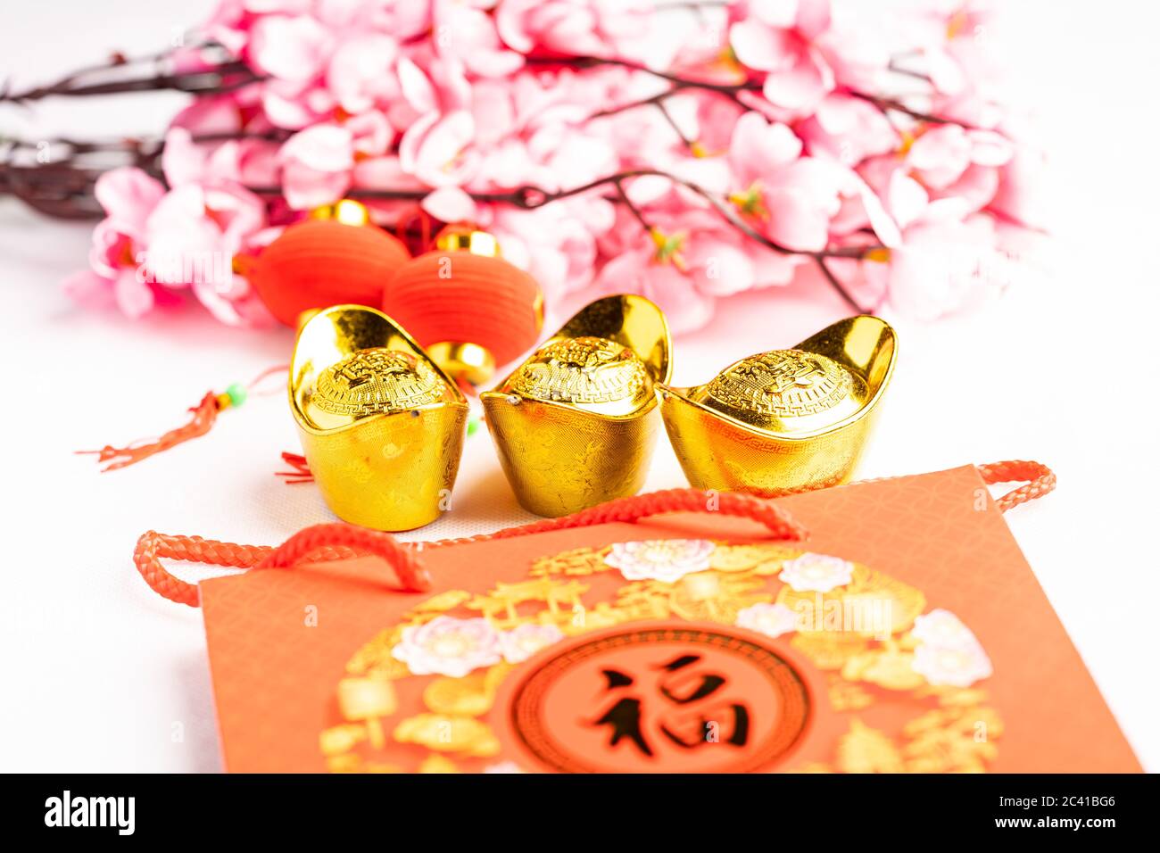 Chinese New Year background. The wordings on gold bar is chinese words ...