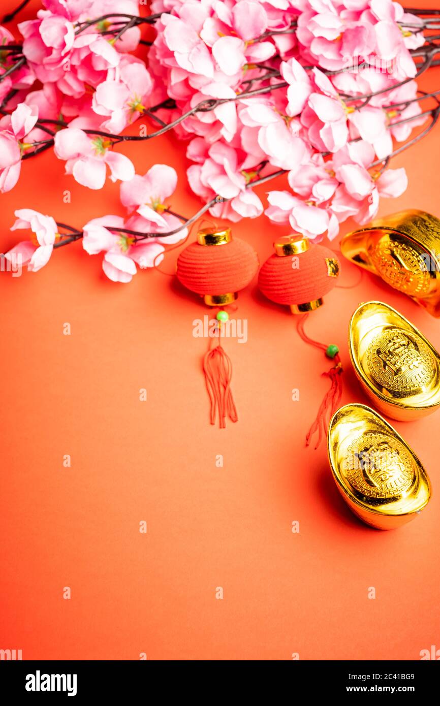 Chinese New Year background. The wordings on gold bar is chinese words ...