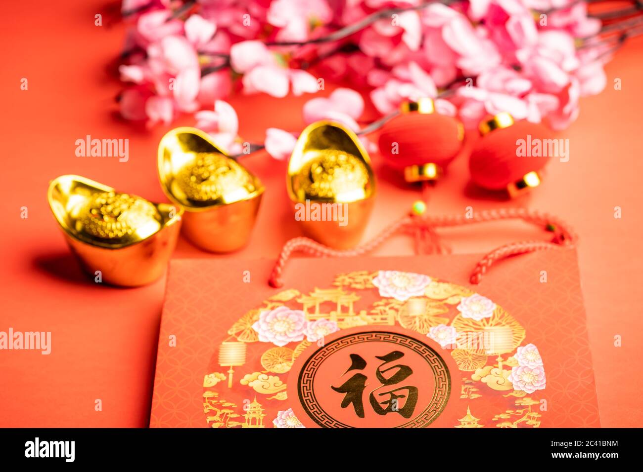 Chinese New Year background. The wordings on gold bar is chinese words ...