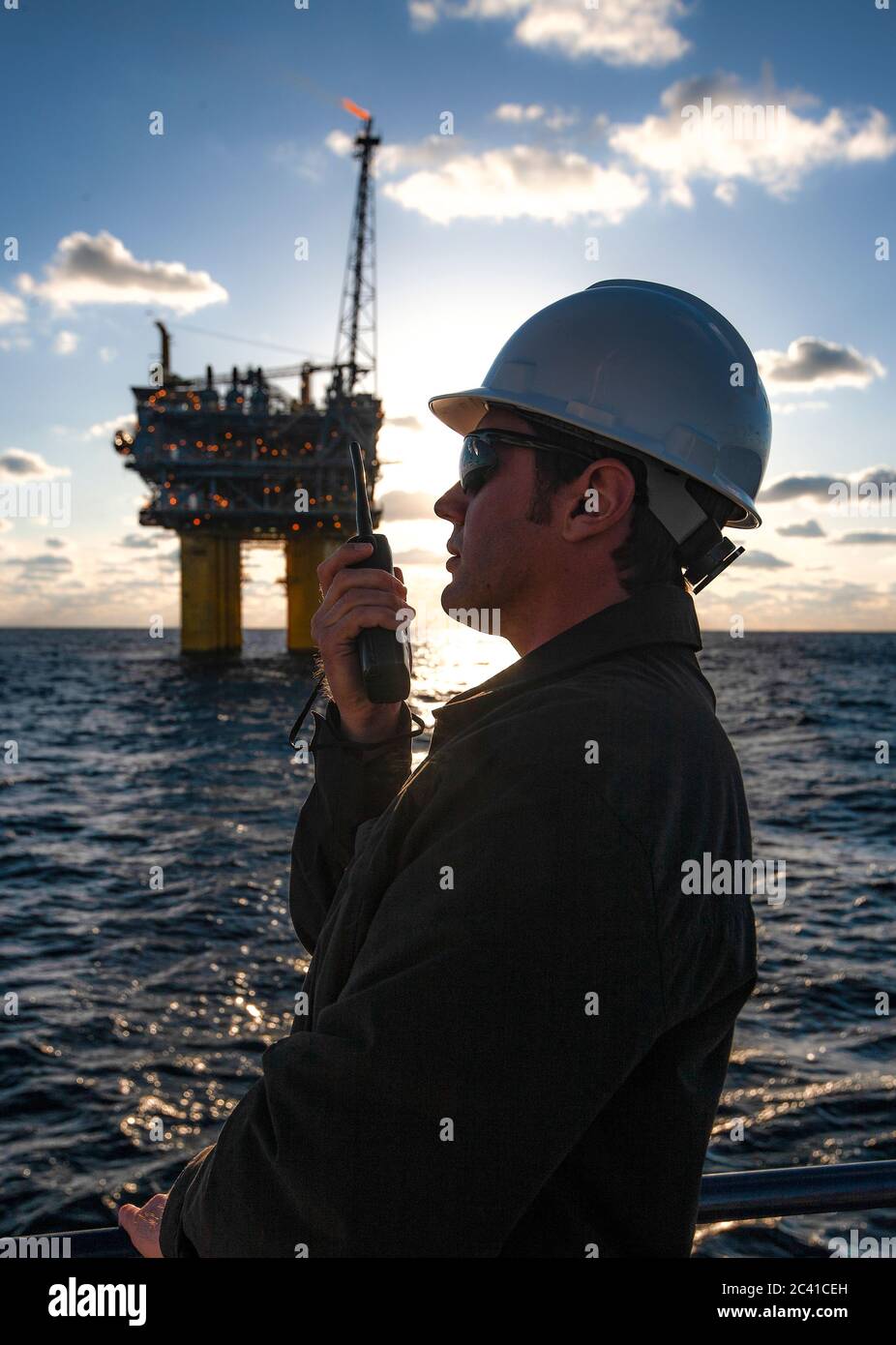Person offshore energy production in the Gulf of Mexico Stock Photo - Alamy
