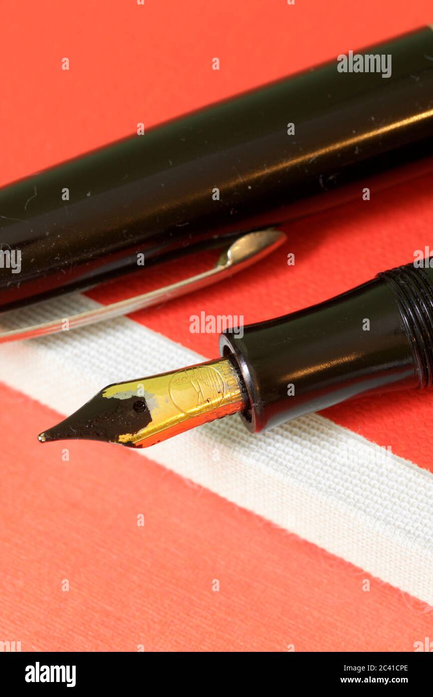 Pen and black ink with red ink hi-res stock photography and images - Alamy