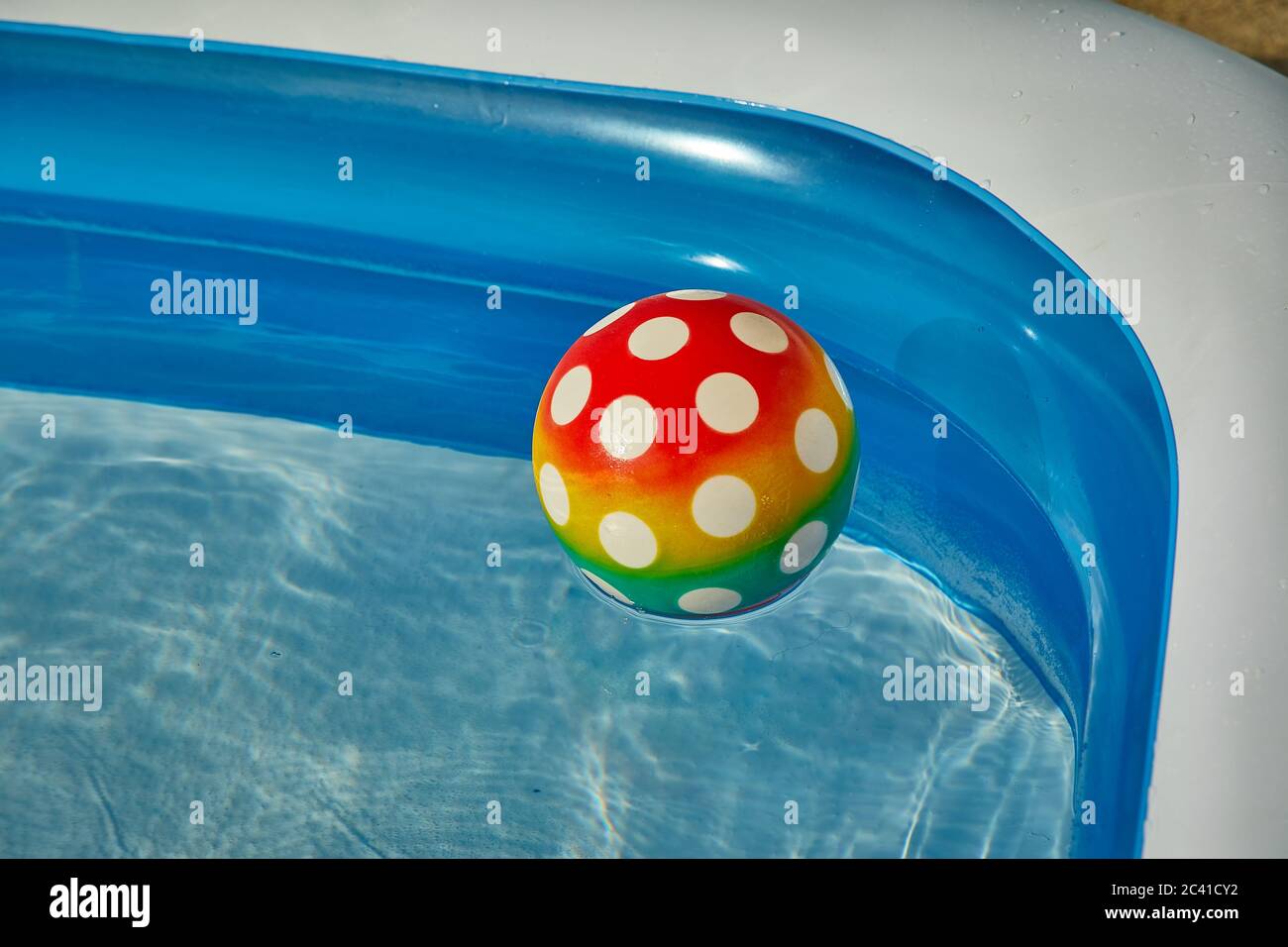 Ball in the water of a pool Stock Photo - Alamy