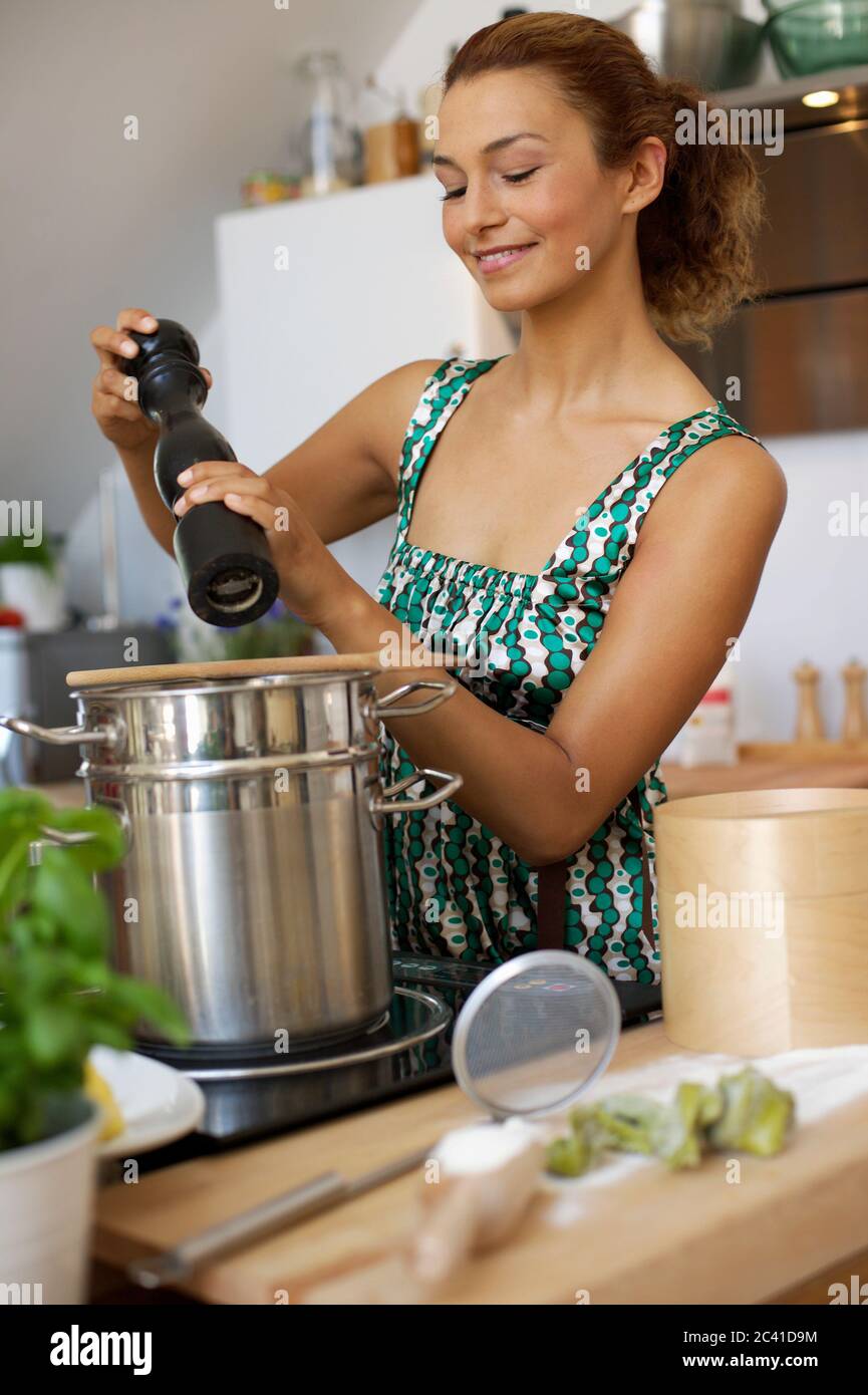 Woman spice grinder hi-res stock photography and images - Alamy