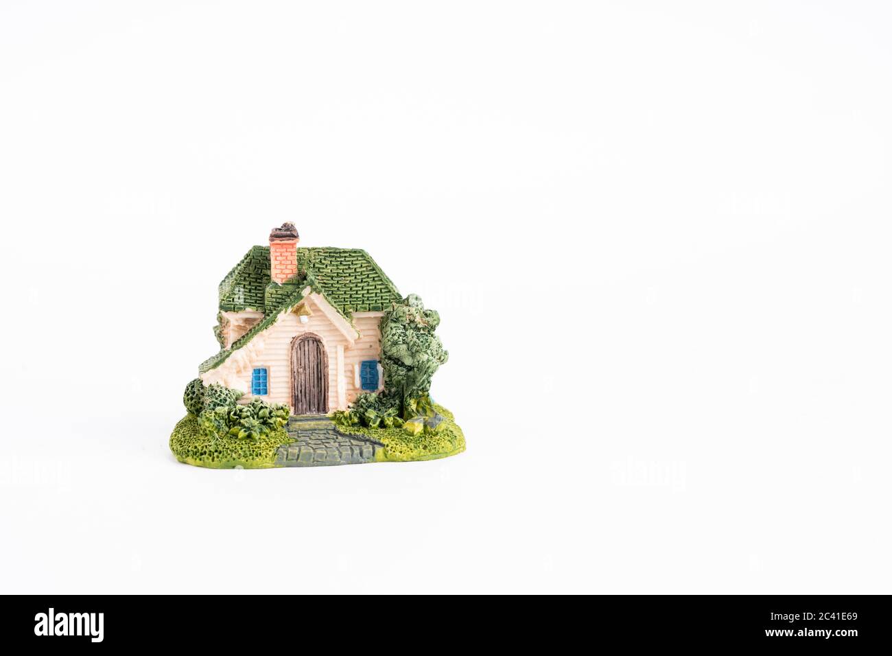 Miniature house isolated on white background Stock Photo - Alamy