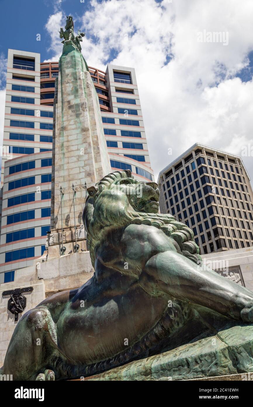 Closeup of a bronze lion of the Wellington Cenotaph at intersection ...