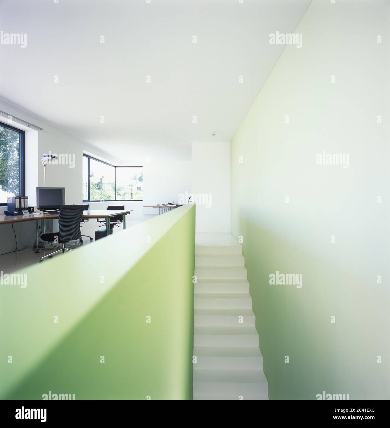 Steps lead up to a modern office interior design Stock Photo - Alamy