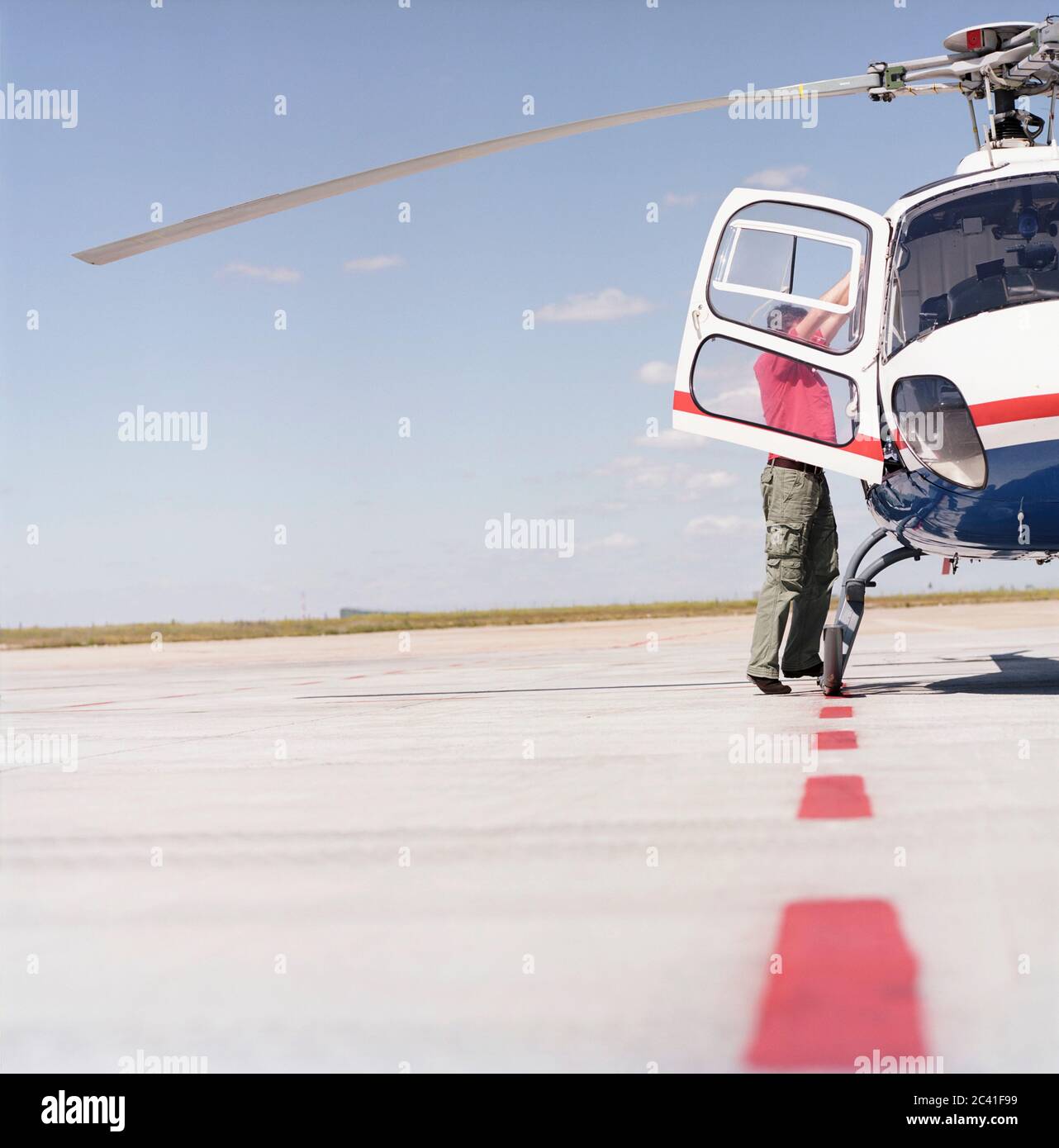A helicopter on the ground Stock Photo - Alamy