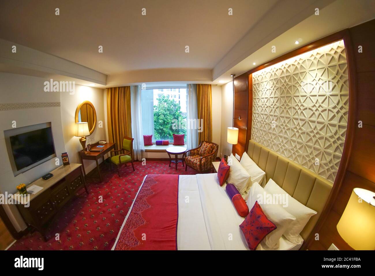 Luxury hotel room with open window wide shot Stock Photo - Alamy