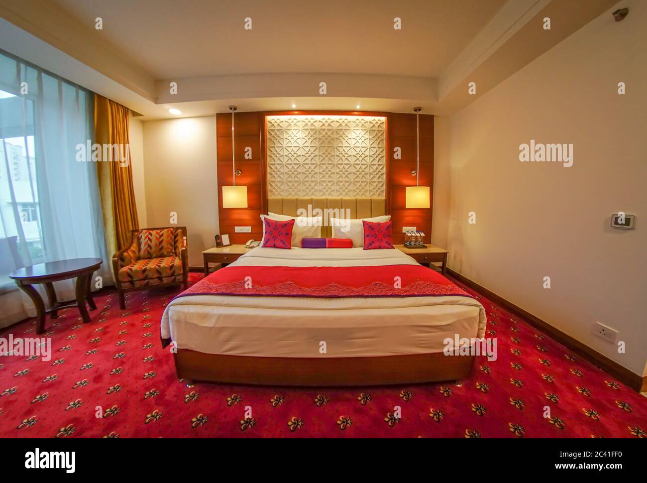 Luxury hotel room with open window wide shot Stock Photo - Alamy